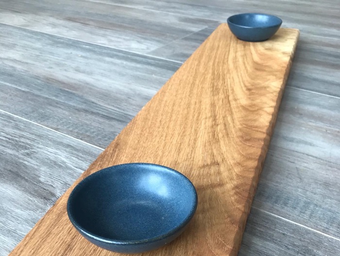 Long serving board with sculpted edge and double dishes :: Owen Blackwood